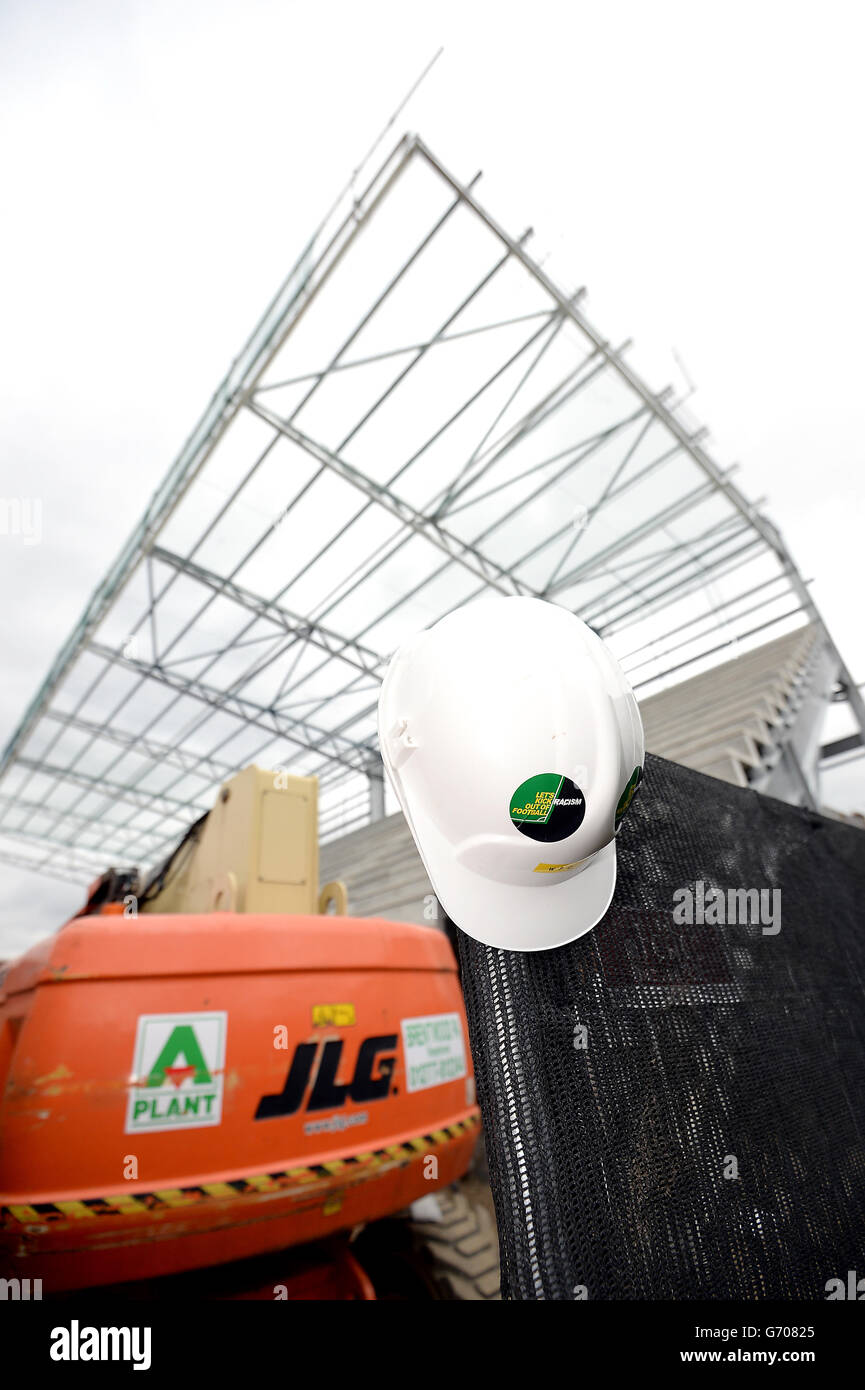 A lets kick racism out of football sticker on a hard hat Stock Photo ...
