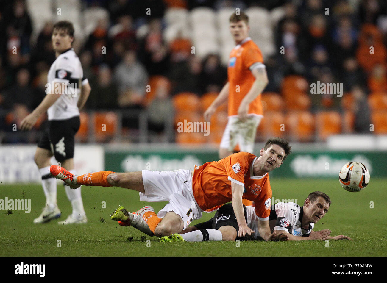 Blackpool's Chris Basham and Derby County's Craig Bryson clash for the ...