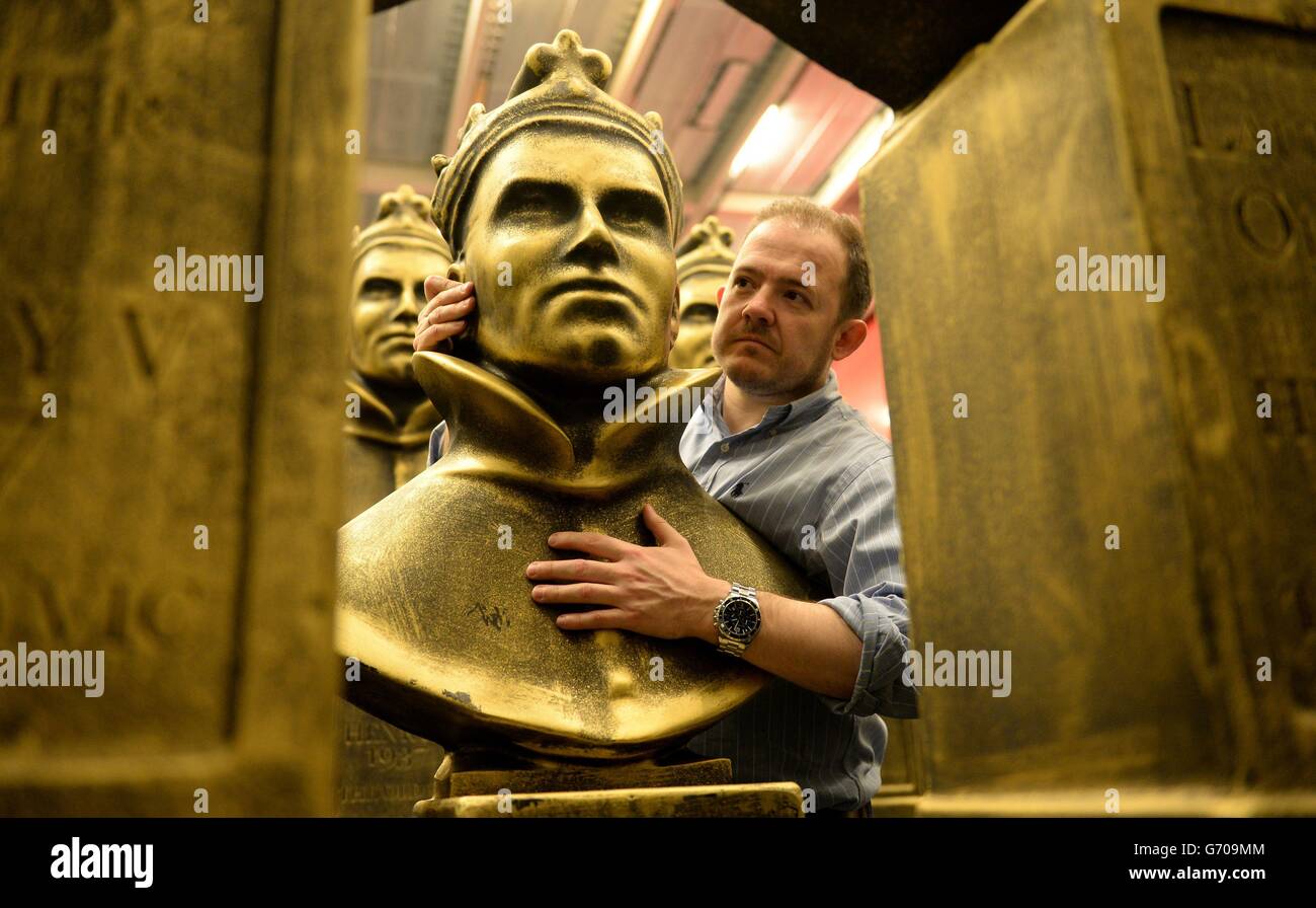 Lee Batty, Head of Production for the Olivier Awards, adjusts a model ...