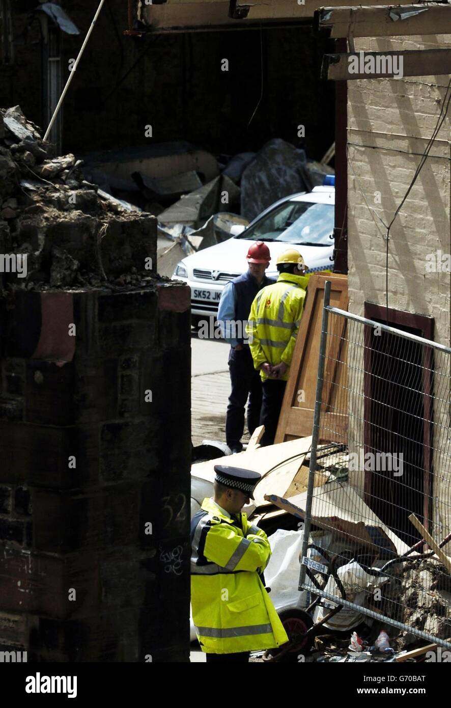 Disaster collapse wall demolition worker safety police hi-res stock ...