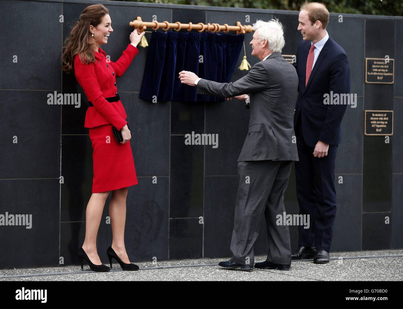 The Duke and Duchess of Cambridge, laugh as the cord they were pulling ...