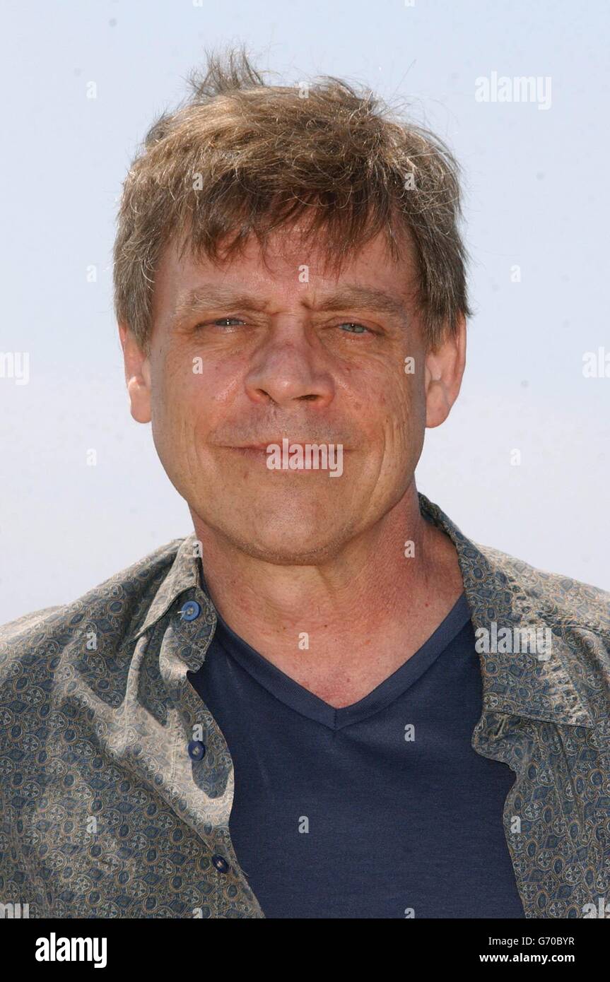 Actor Mark Hamill poses for photographers during a photocall to promote ...