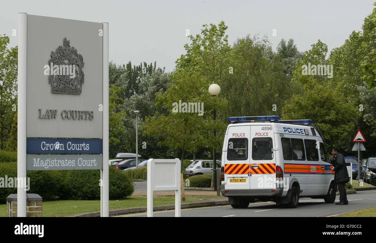 A police van outside Belmarsh court in south-east London where Muslim ...