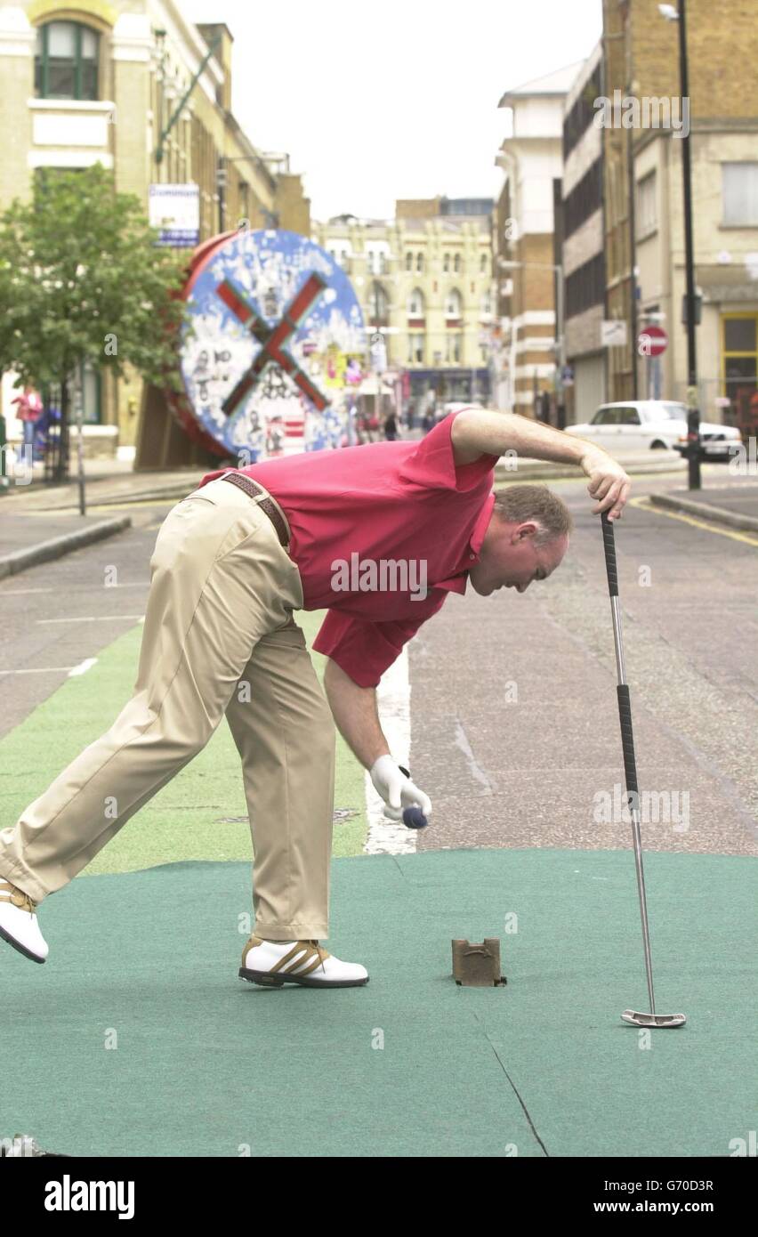 Pro golfer Ronan Rafferty takes part in the Shoreditch Urban Open in ...