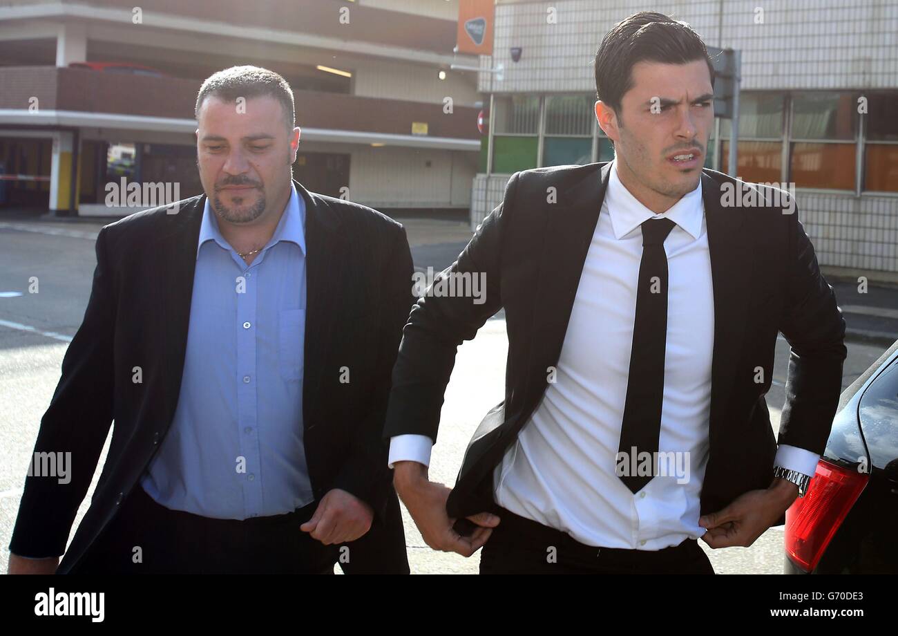 West Ham United footballer James Tompkins (right) arrives at Basildon ...