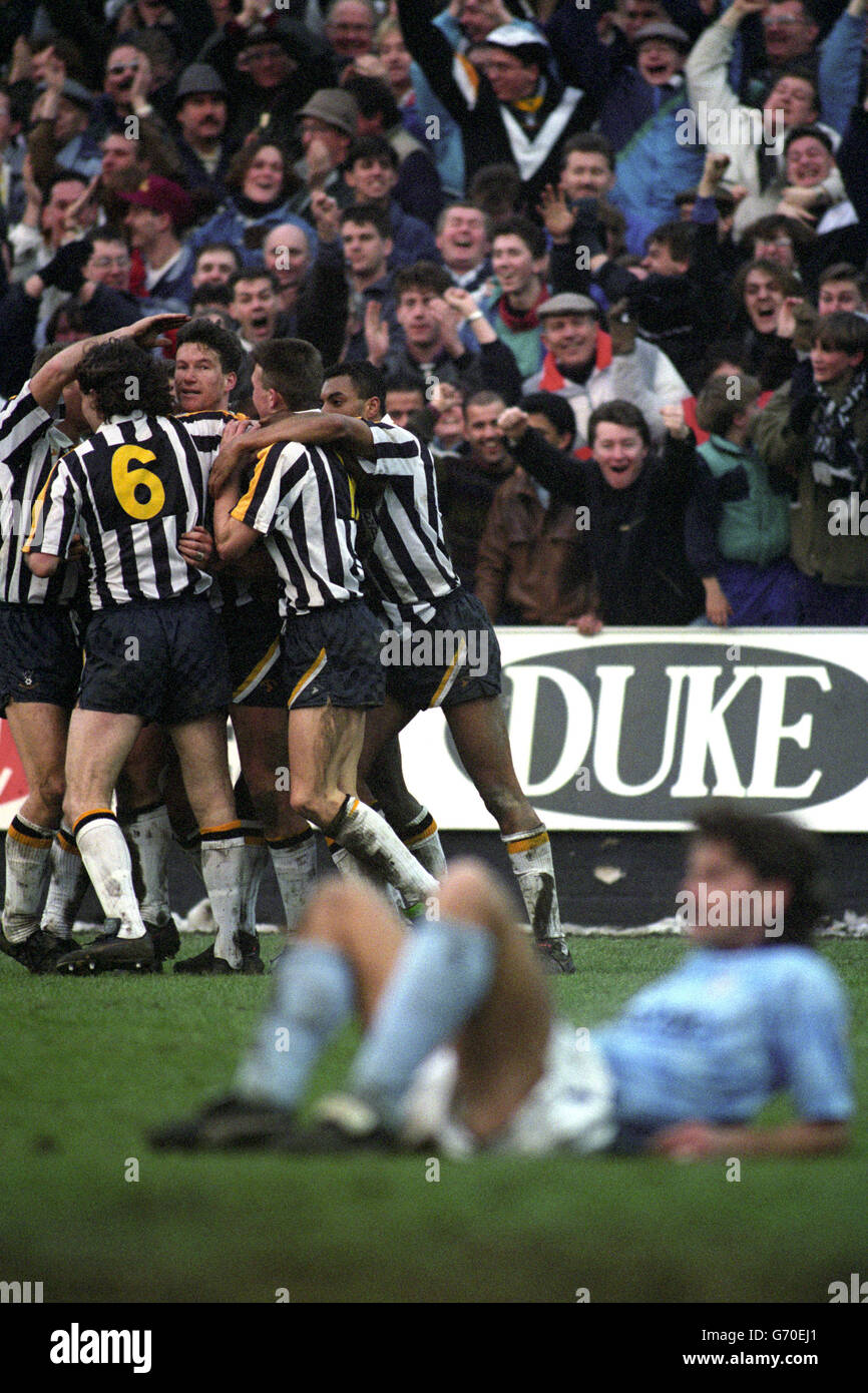Notts County goalscorer Gary Lund looks over towards a dejected Neil ...