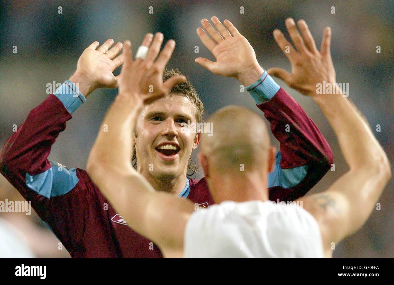 Football action celebrating high five hi-res stock photography and ...