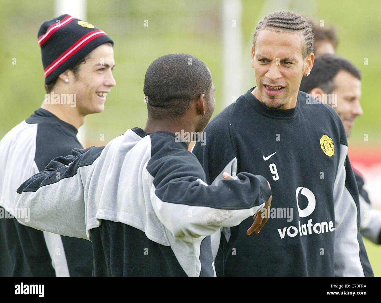 Manchester United's Rio Ferdinand with Cristiano Ronaldo (L) and Eric ...