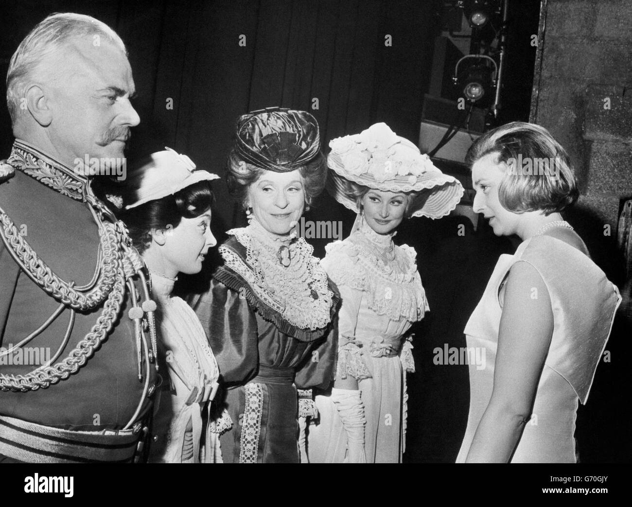 Princess Alexandria talking with principals whom she met on stage ...