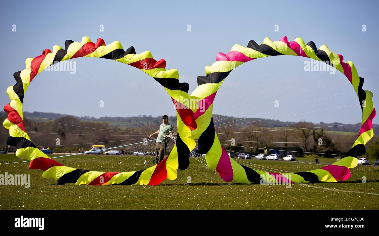 Kite flyer Alan Pinnock launches his pair of circular kites in the mild ...