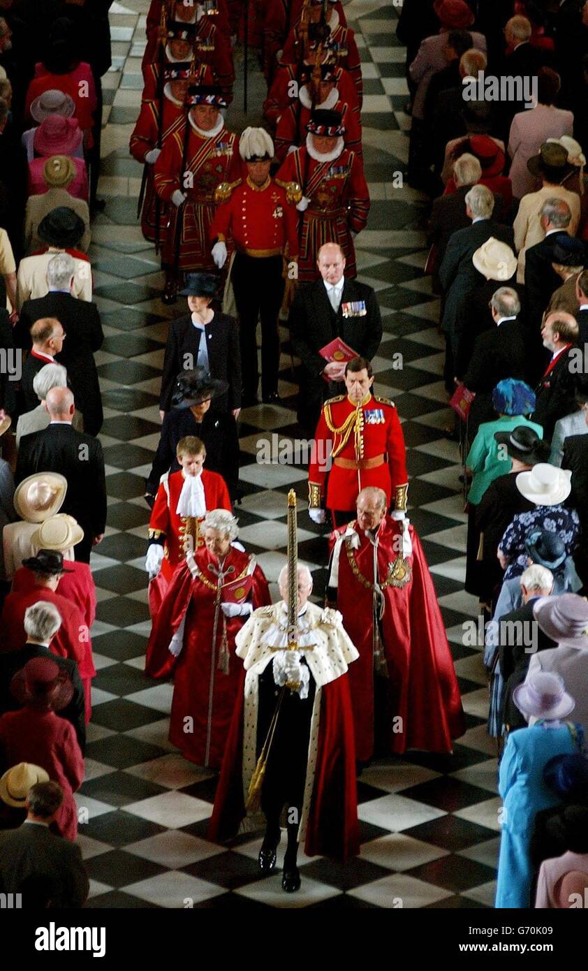 Queen Elizabeth II and the Duke of Edinburgh in the procession during a ...