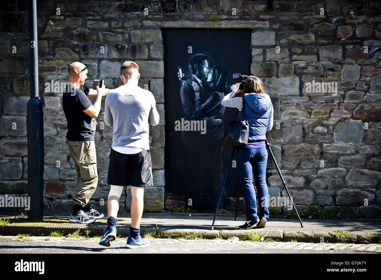 People photograph and film the latest officially confirmed banksy ...