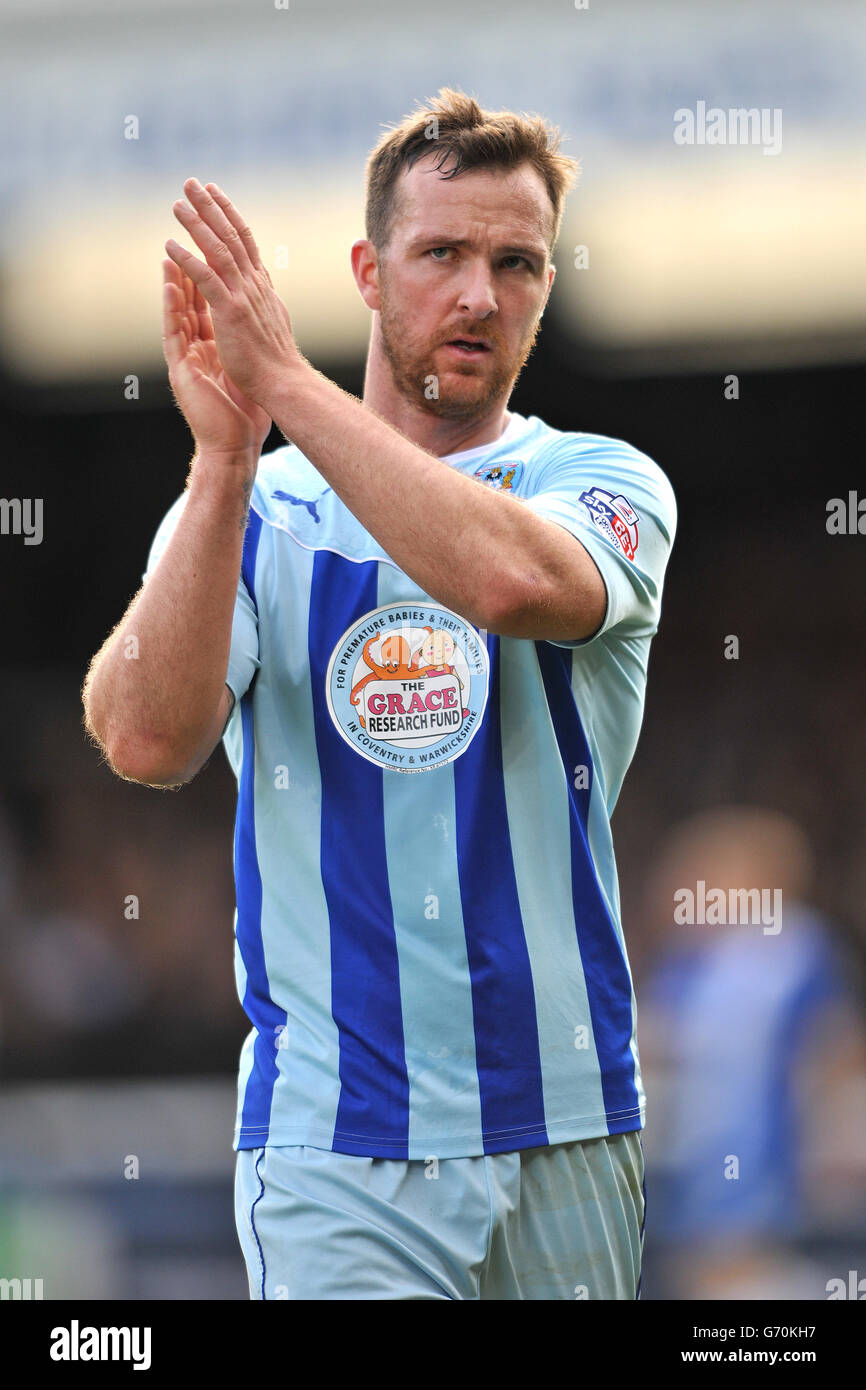 Coventry City's Andy Webster applauds the travelling support Stock ...