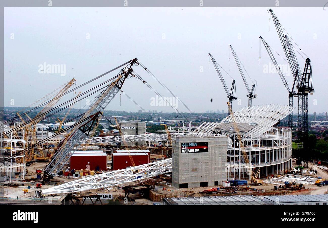Wembley Stadium's 133 metre-high Arch begins its ascent into the London ...