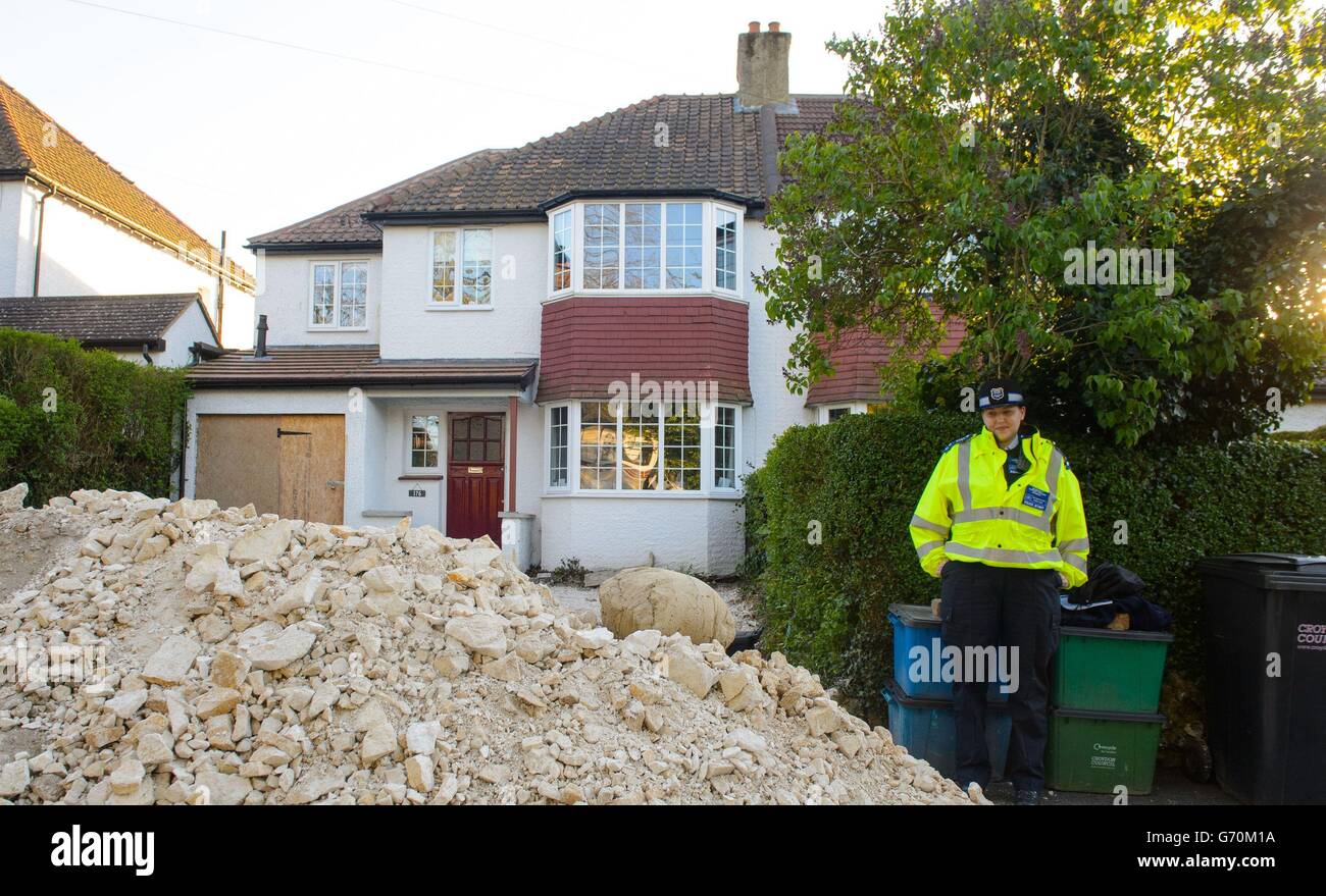 Workmen find bones under driveway Stock Photo - Alamy