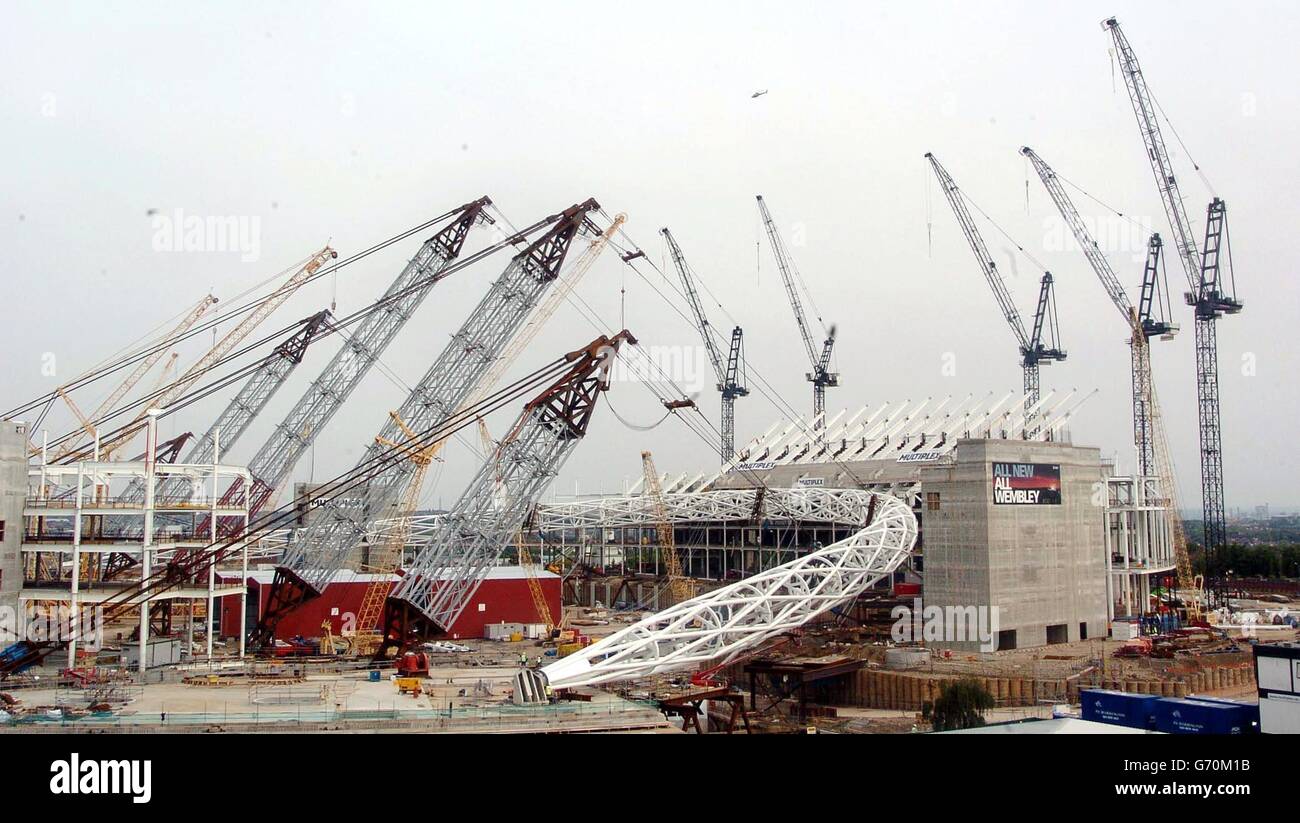 Wembley Stadium's 133 metre-high Arch begins its ascent into the London ...