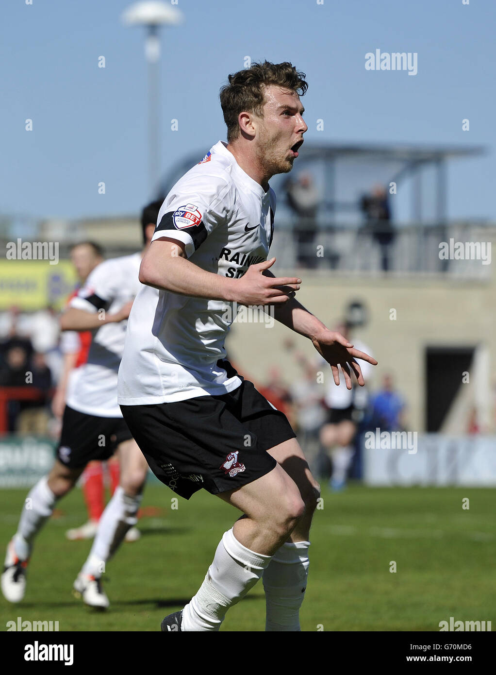 Scunthorpe's Sam Winnall celebrates after he scores the first goal of ...