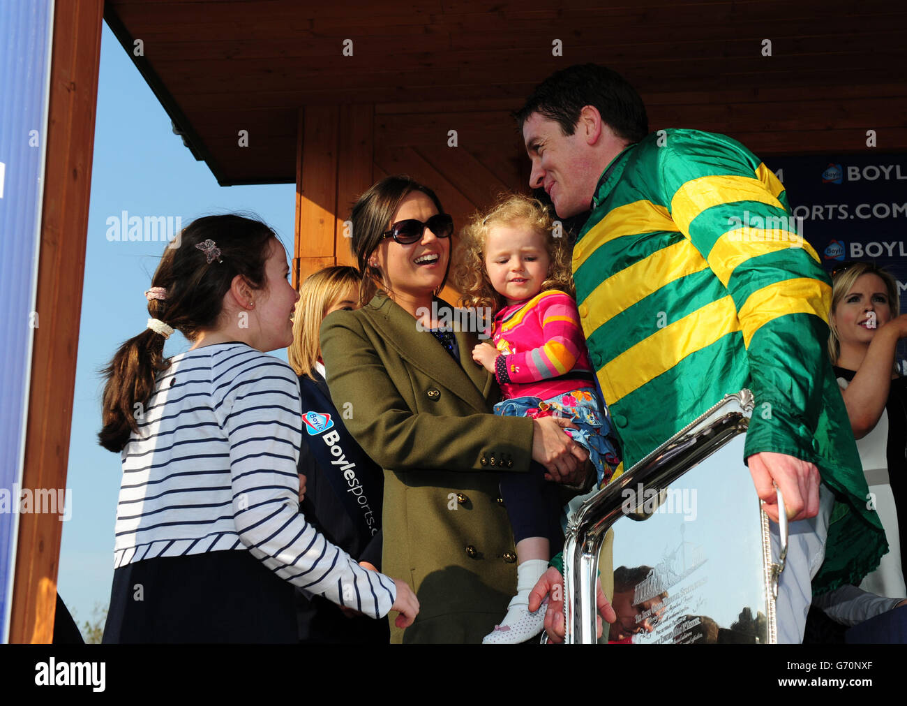 Jockey Barry Geraghty with his family after he rode Shutthefrontdoor to ...