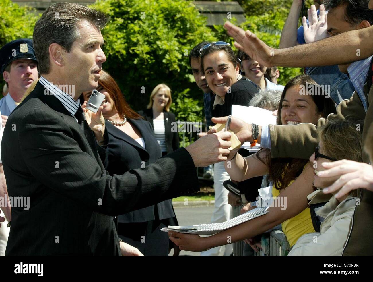 Actor Pierce Brosnan greets fans after receiving an honoury degree of ...