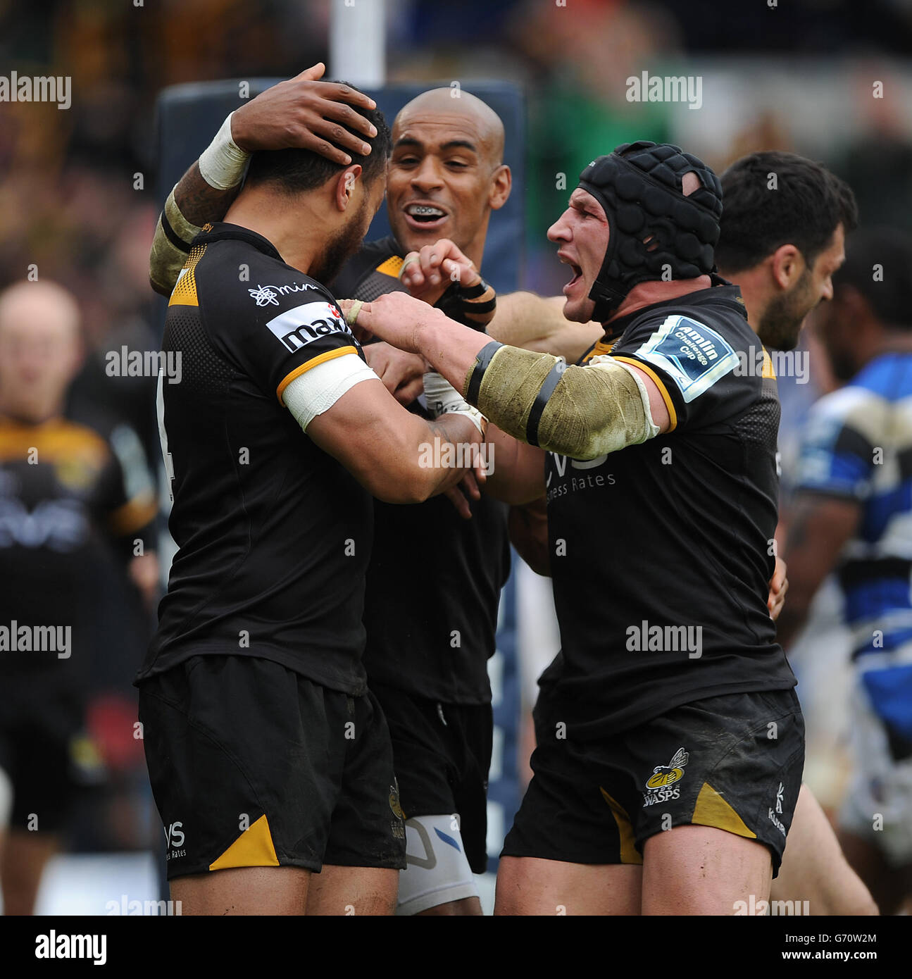 Wasps' Will Helu (left) celebrates with Tom Varndell (centre) and Carlo ...