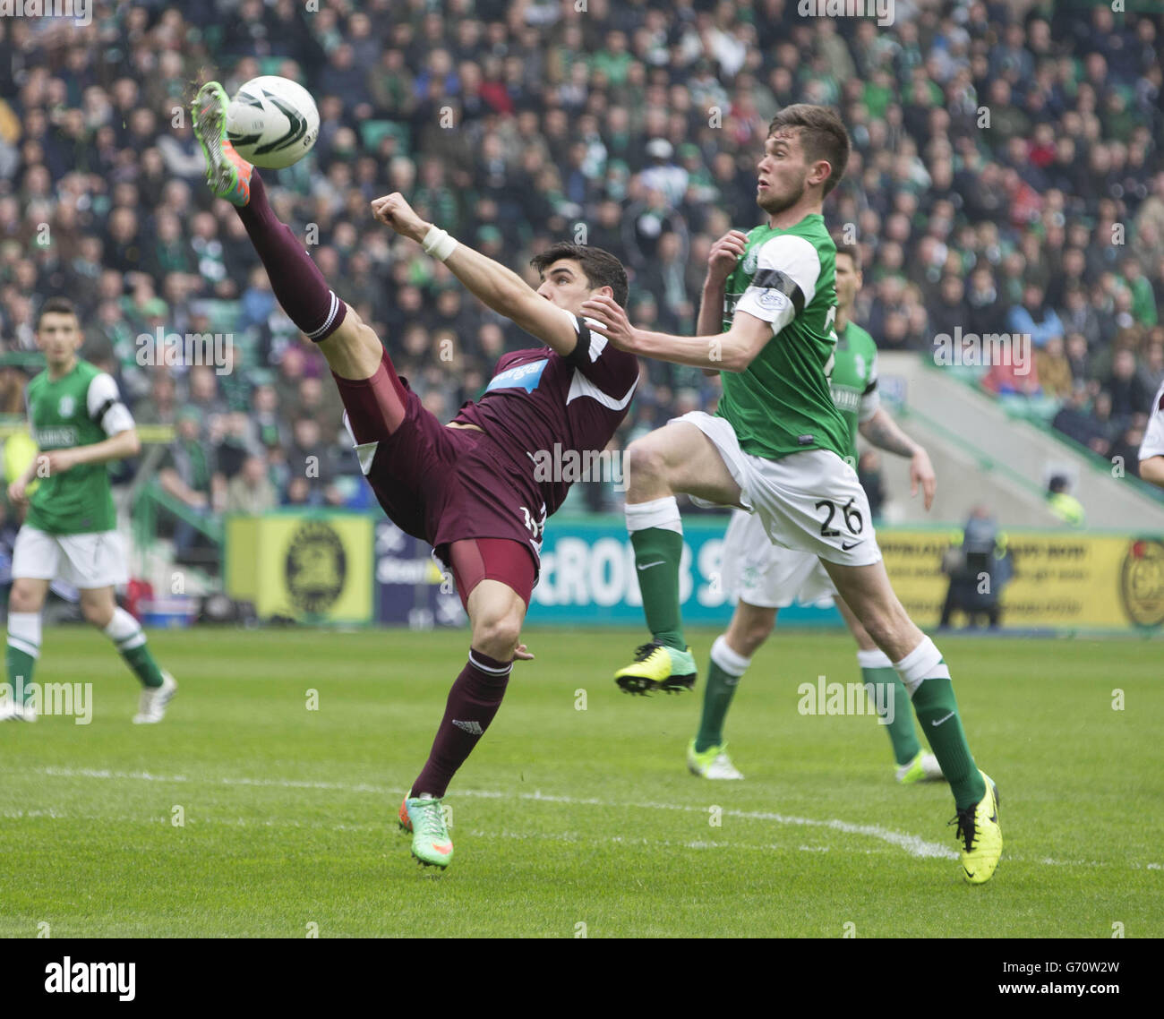 Hearts' Callum Paterson (left) and Hibernian Sam Stanton (right) battl ... Hearts' Callum Paterson (left) and Hibernian Sam Stanton (right) battl ...