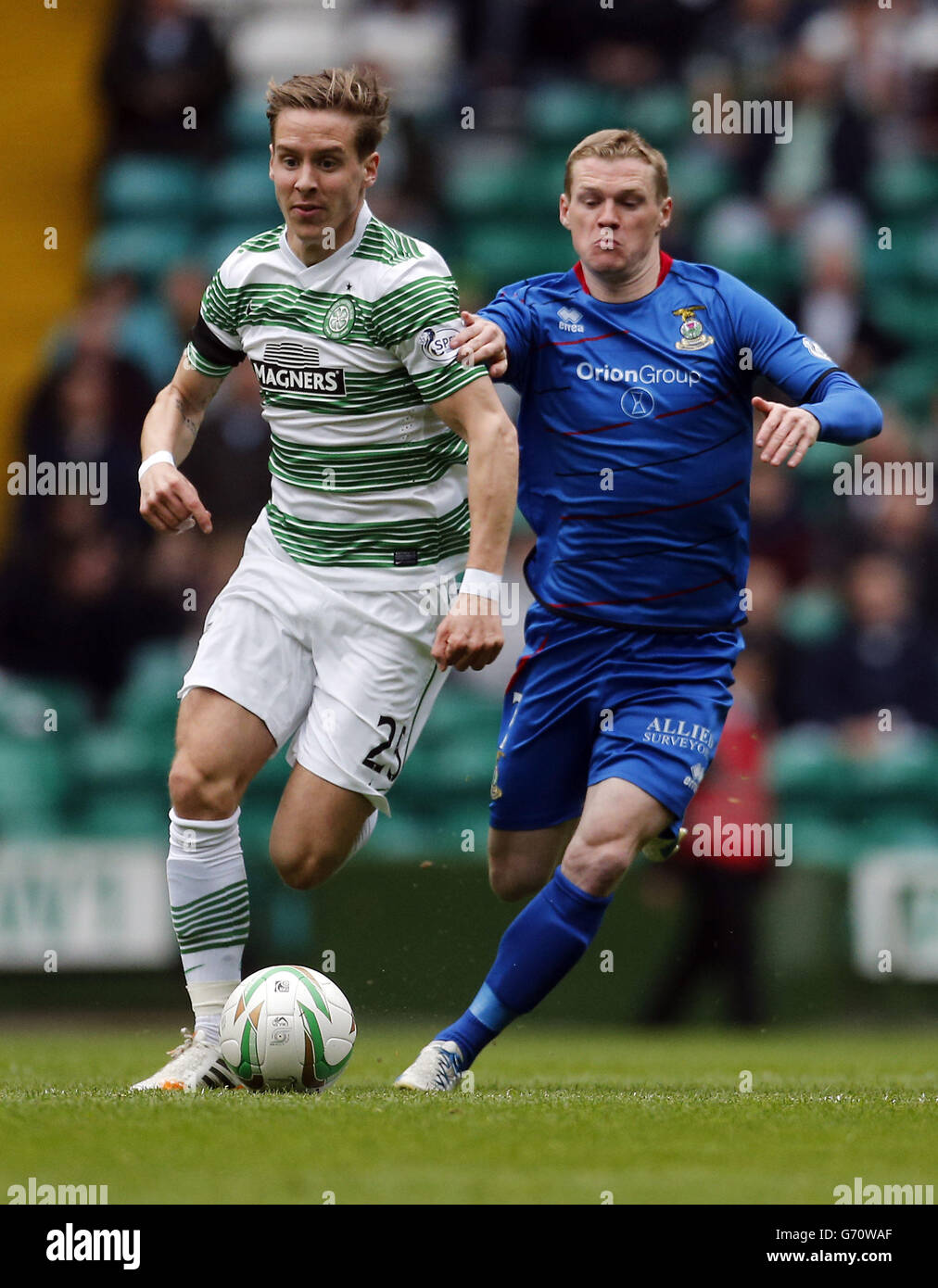 Celtic's Stefan Johnansen (left) and Inverness' William McKay battle ...