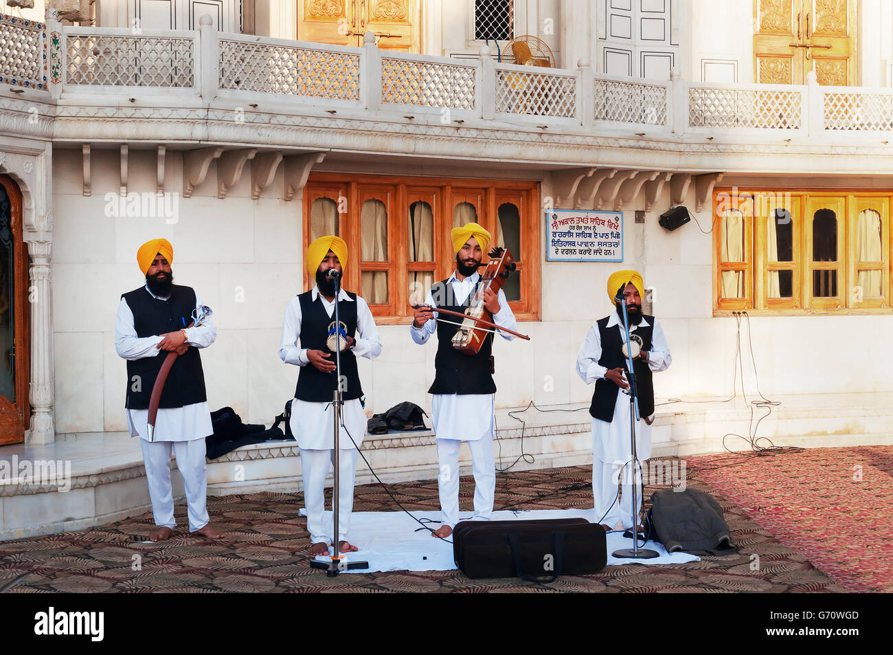 Indian musicians playing local instruments at Golden Temple (Harmandir ...