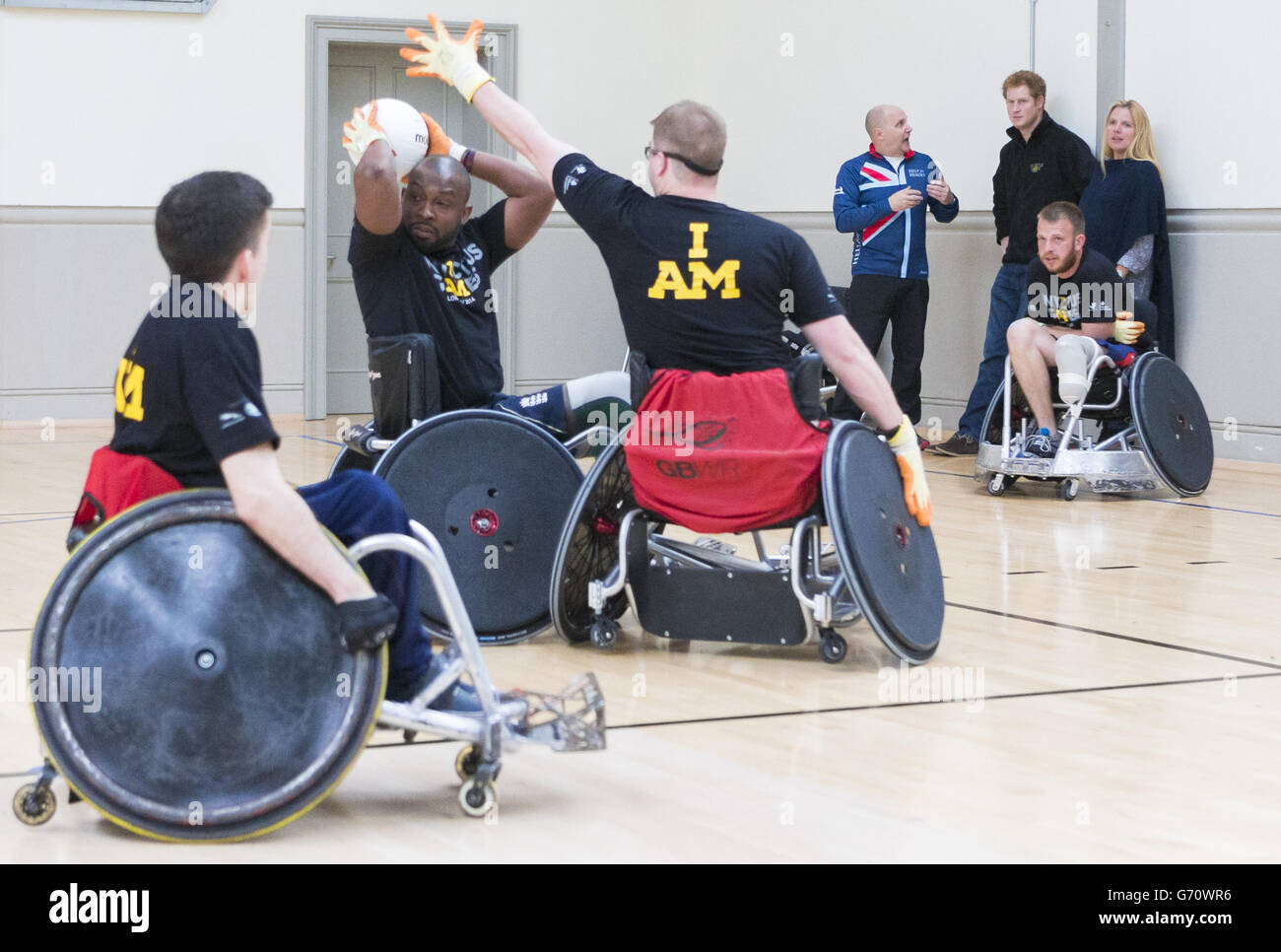 Prince Harry watches veterans playing murder ball in wheel-chairs ...