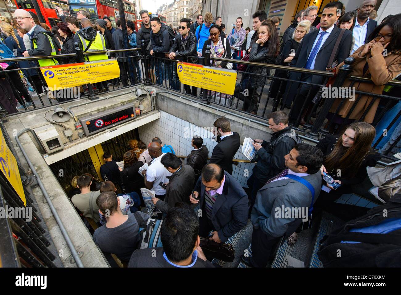 People queue outside Oxford Circus underground station, in central ...