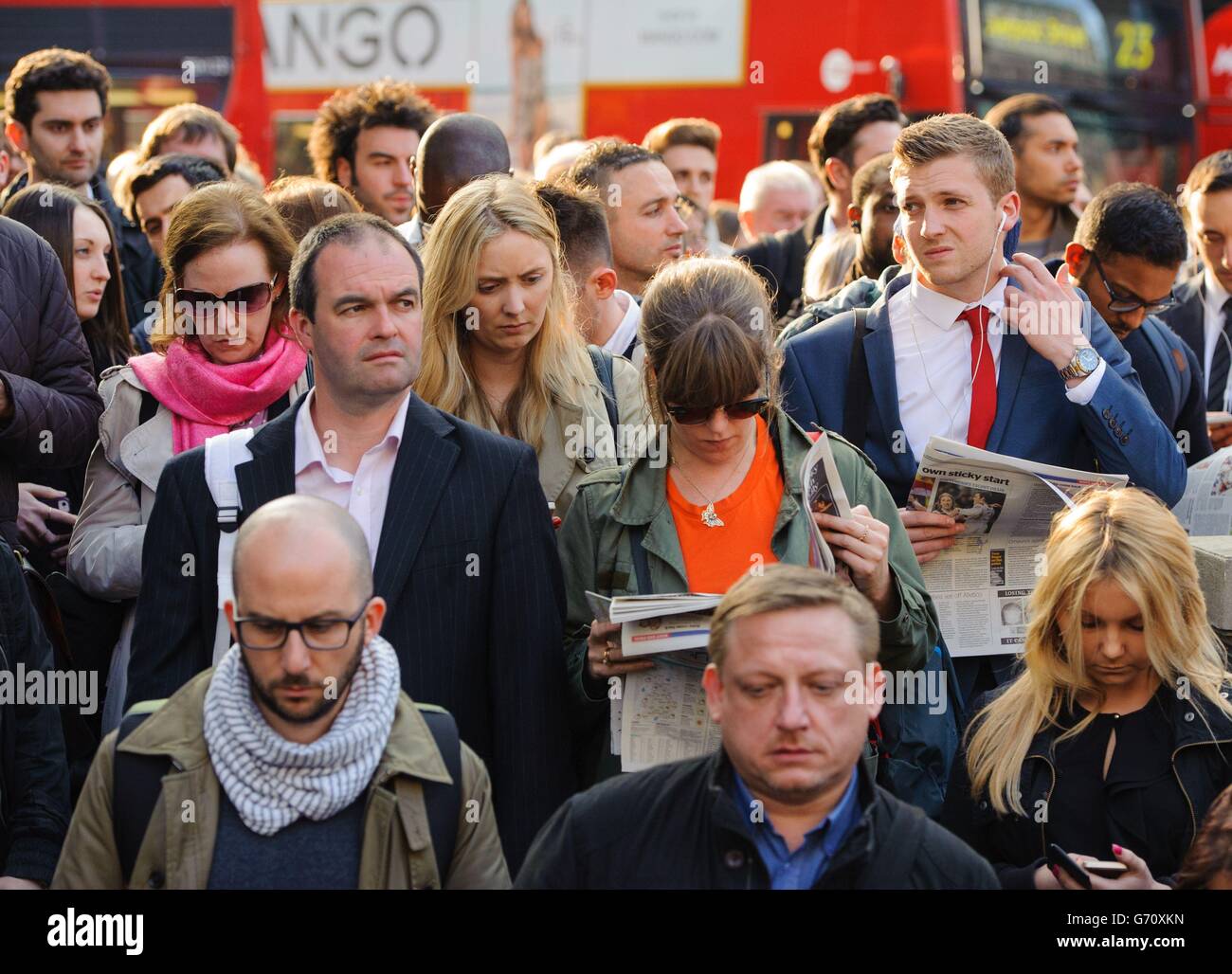 People queue outside Oxford Circus underground station, in central ...
