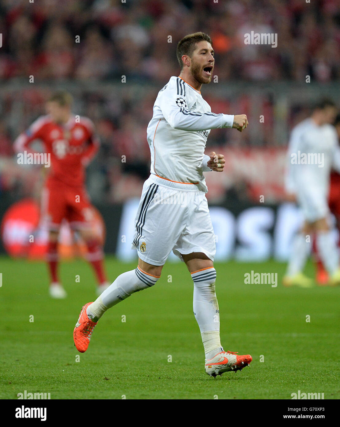 Real Madrid's Sergio Ramos celebrates scoring his side's first goal of ...