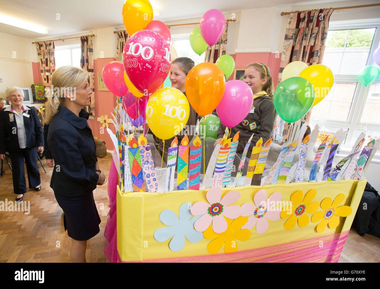 The Countess of Wessex talks to Brownies in their massive birthday cake ...