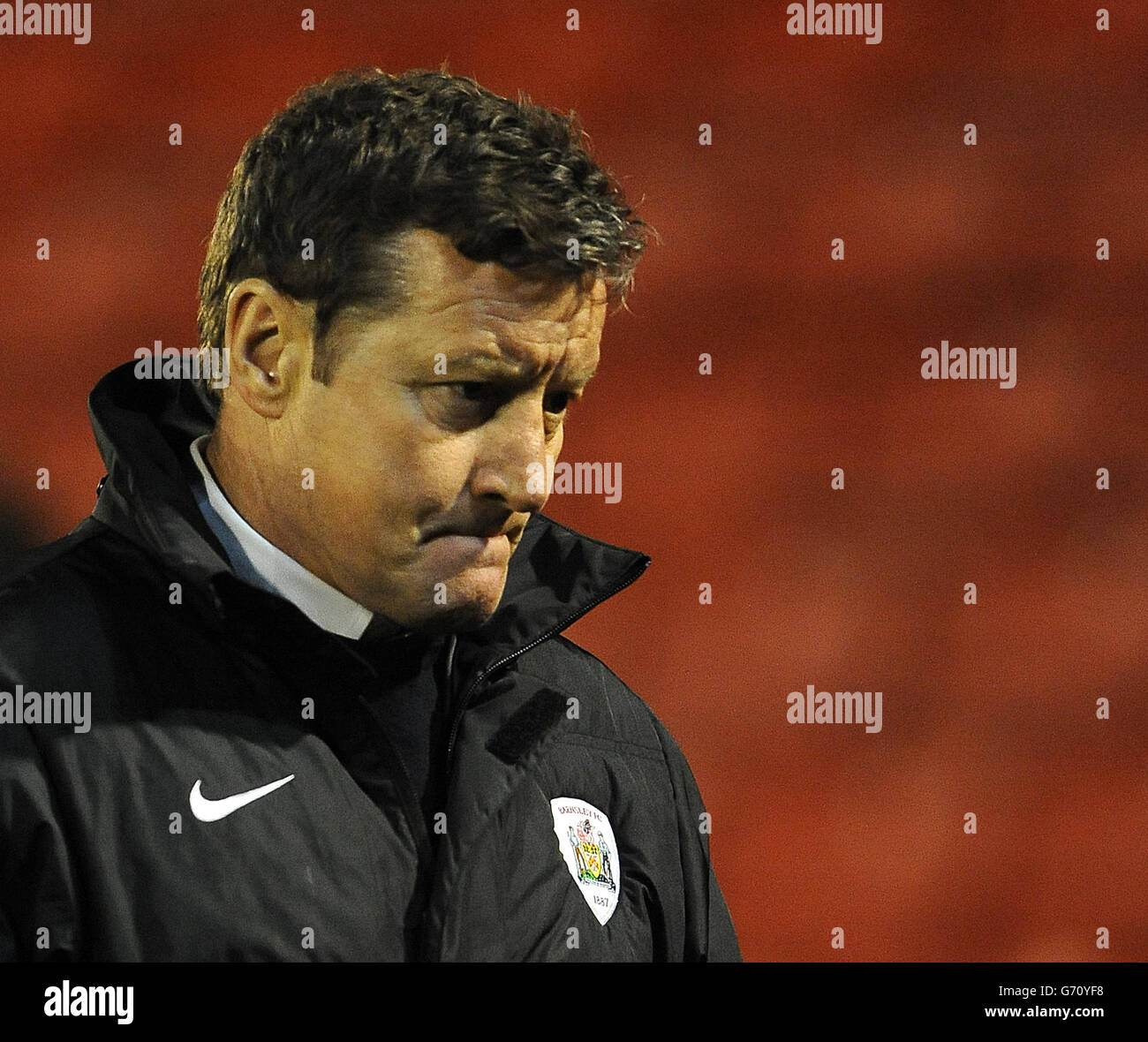 Barnsley's Manager Danny Wilson leaves the field at half time during ...