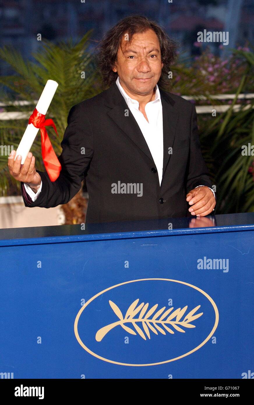 Director Tony Gatlif with his award for Best Director for his film ...