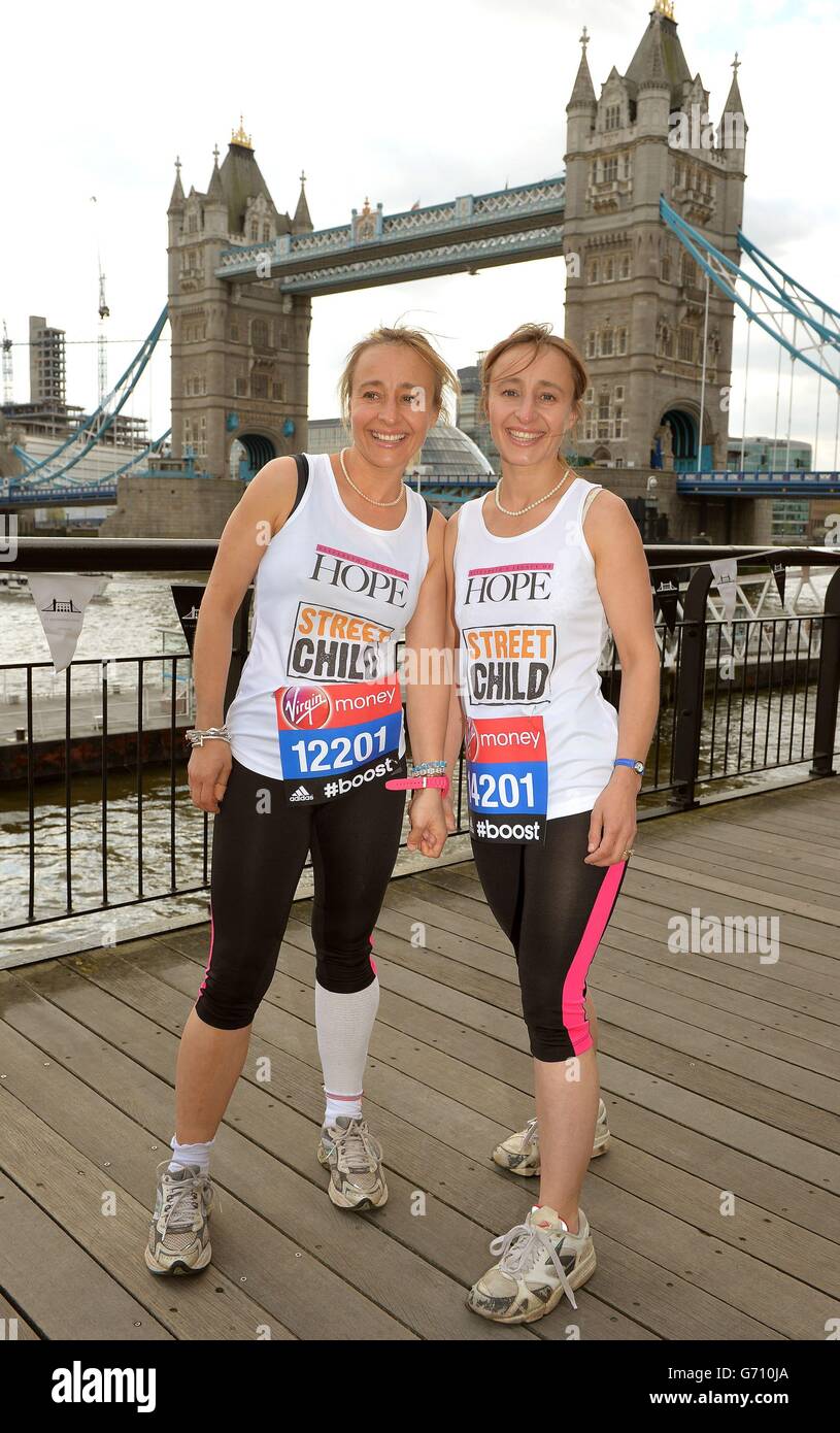 Twin sisters holding hands hi-res stock photography and images - Alamy