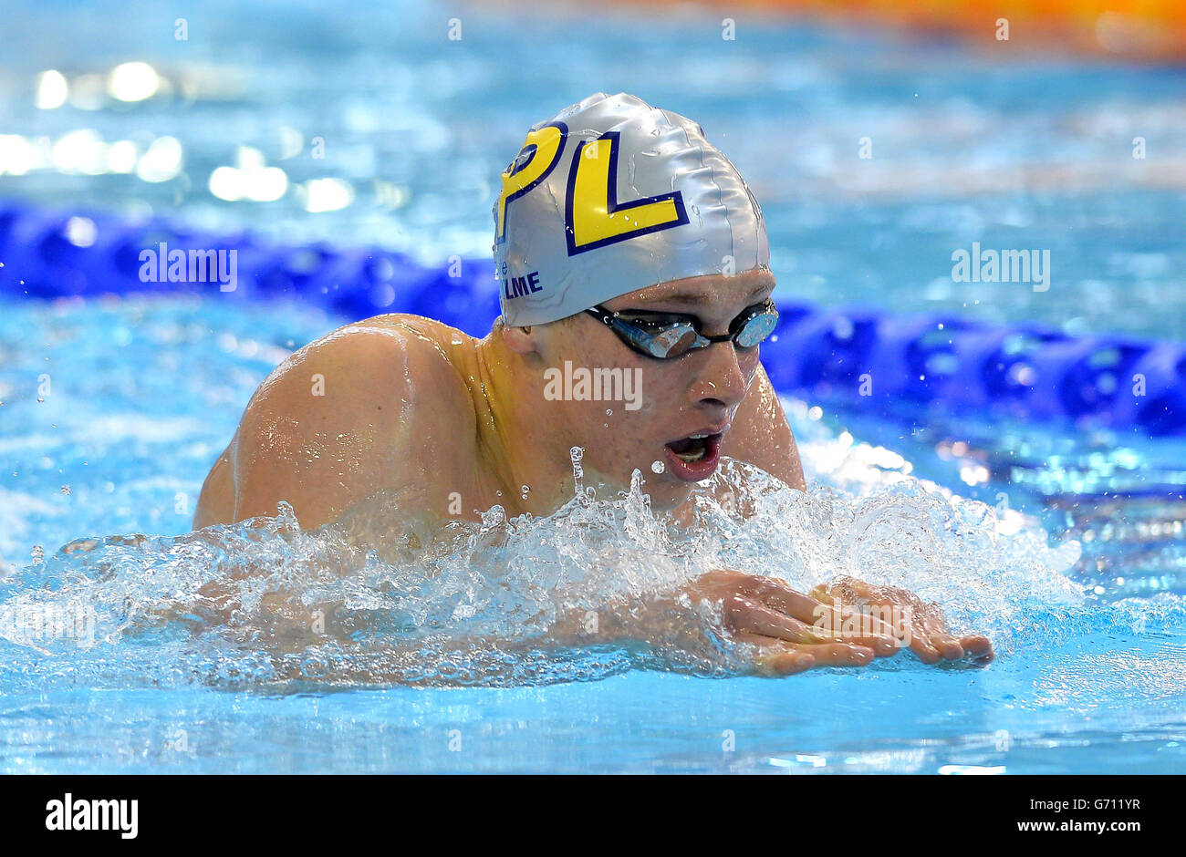 Joseph Hulme competing in the Men's Open 200m IM heats during the 2014 ...
