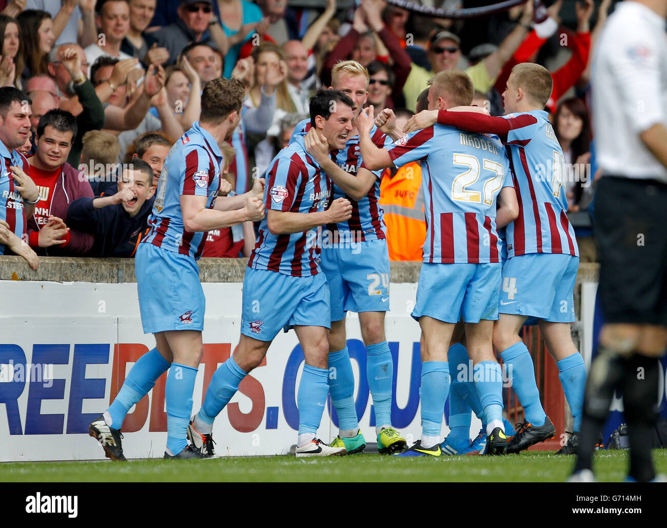 Scunthorpe's Matthew Sparrow, (second left) and team mates celebrate ...