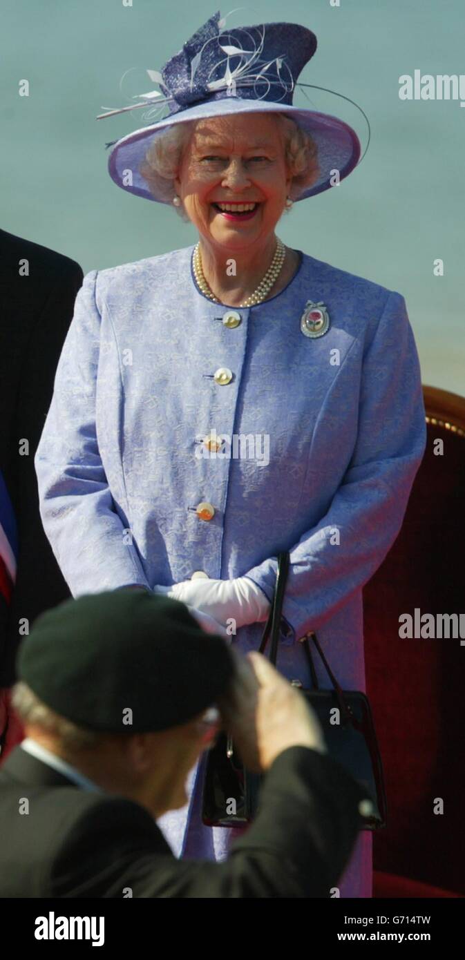 Britain's Queen Elizabeth II takes the Salute from the D-Day veterans ...