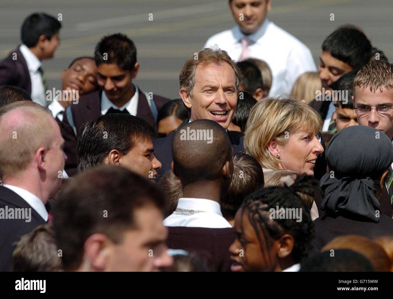 Prime Minister Tony Blair meets pupils and staff at the Perry Beeches ...