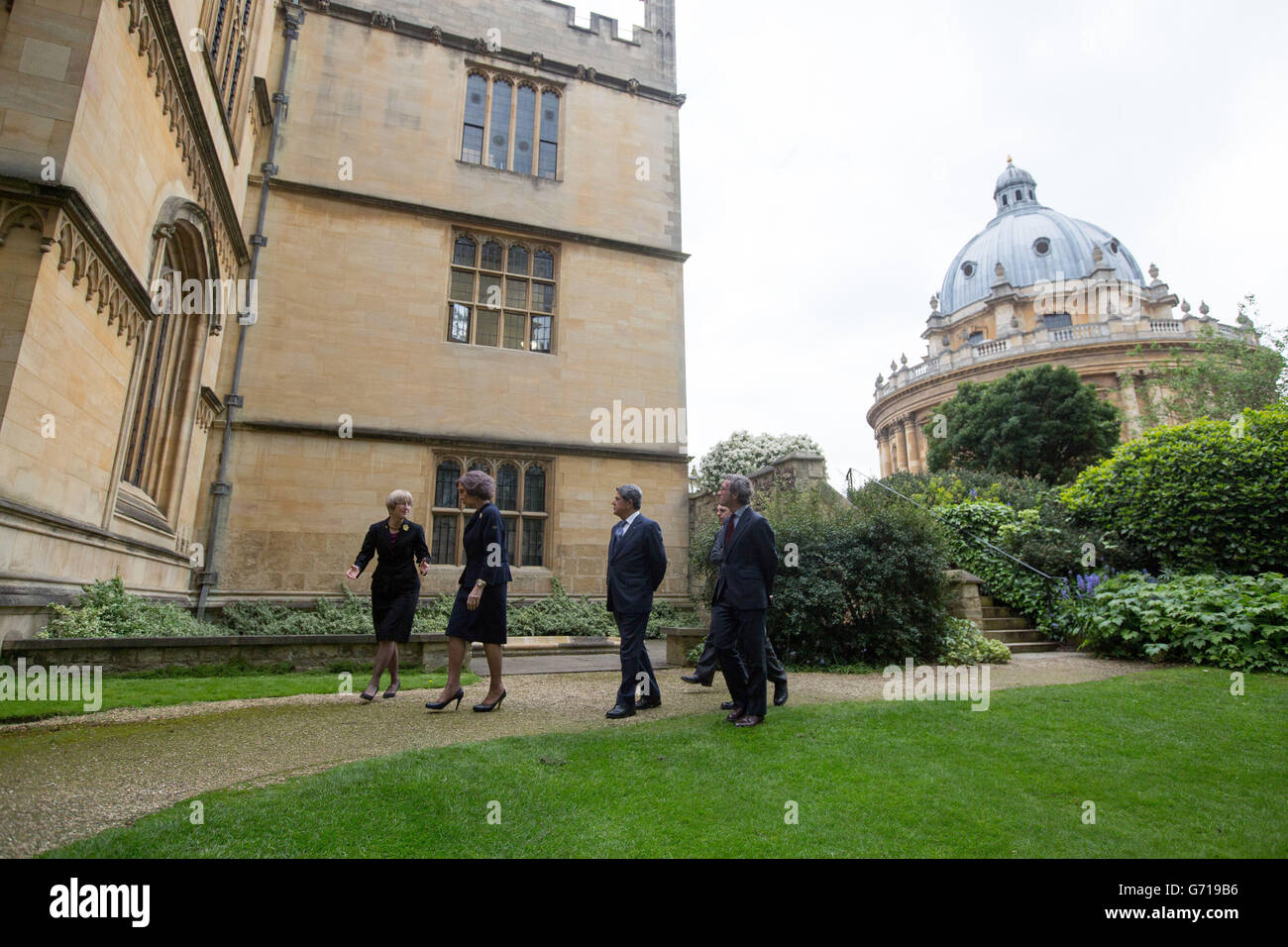Queen Sofia of Spain (centre) is shown the Fellows Gardens by rector ...