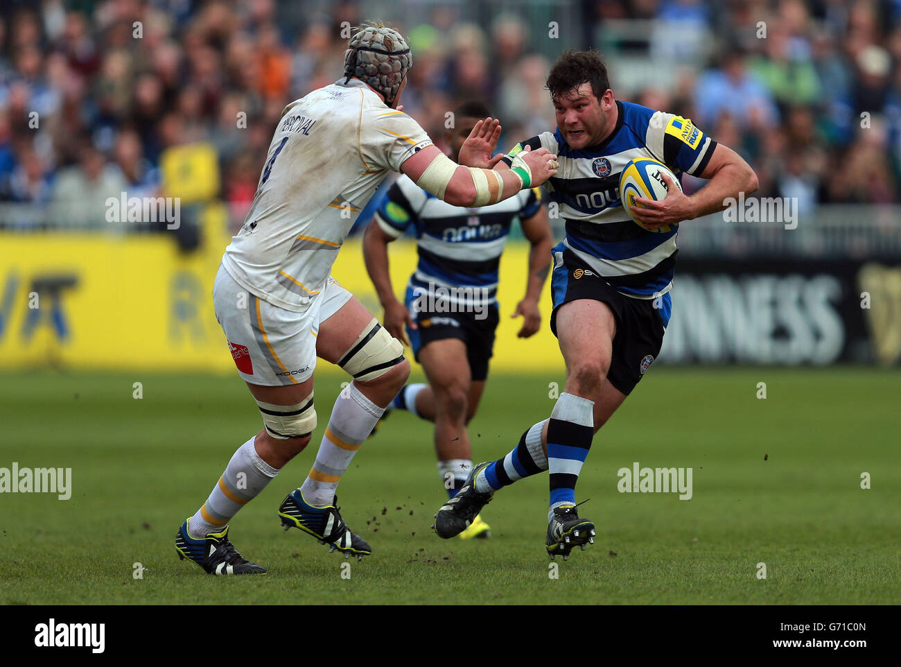 Bath's Nathan Catt hands off Worcester's James Percival during the ...