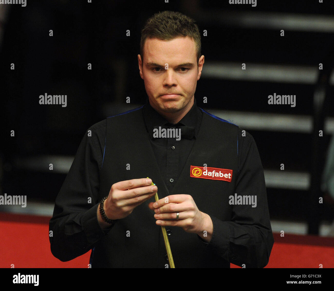 Jamie Cope at the table in his first round match against Shaun Murphy ...
