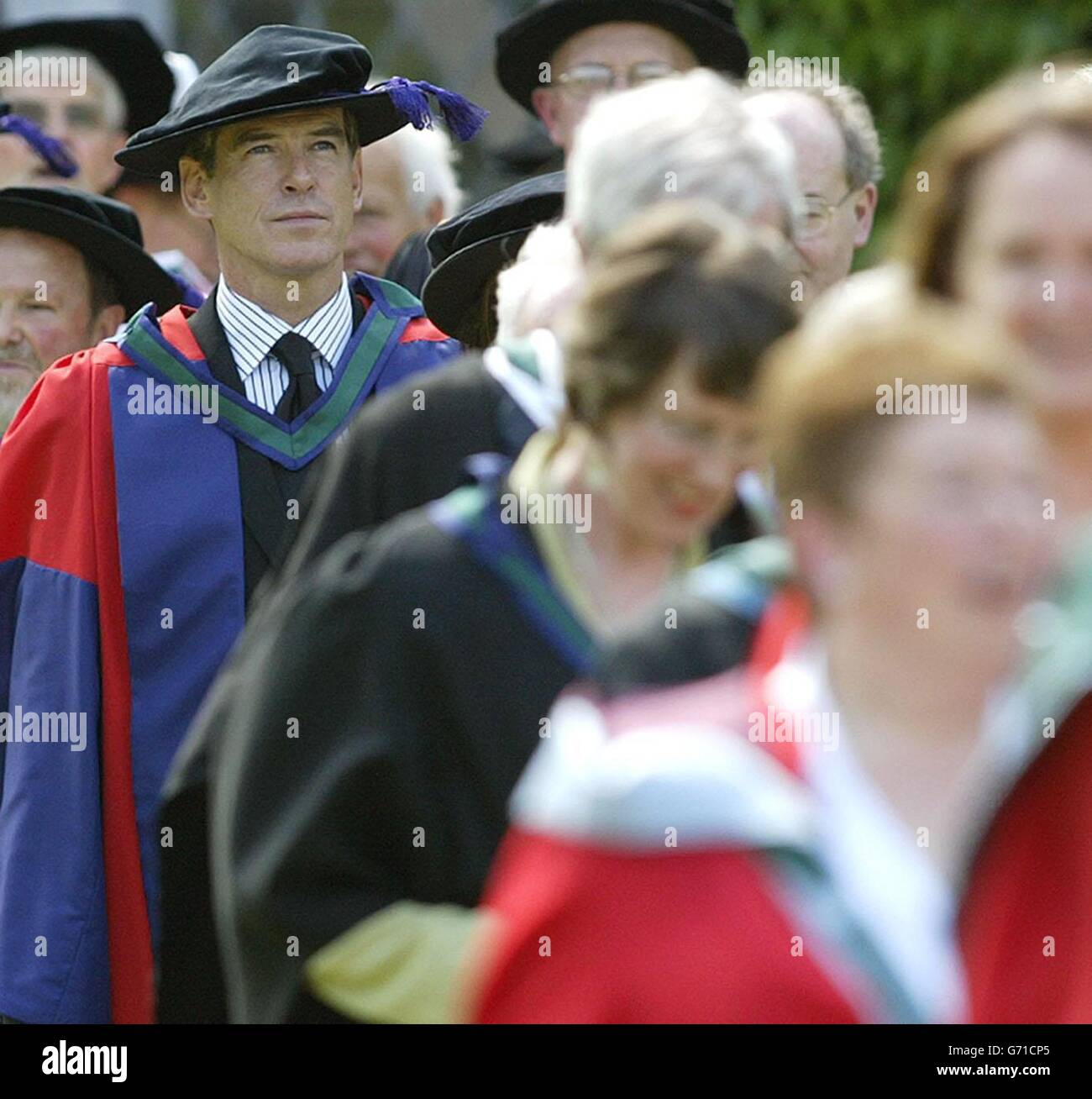 Actor Pierce Brosnan forms part of the procession on his way to ...