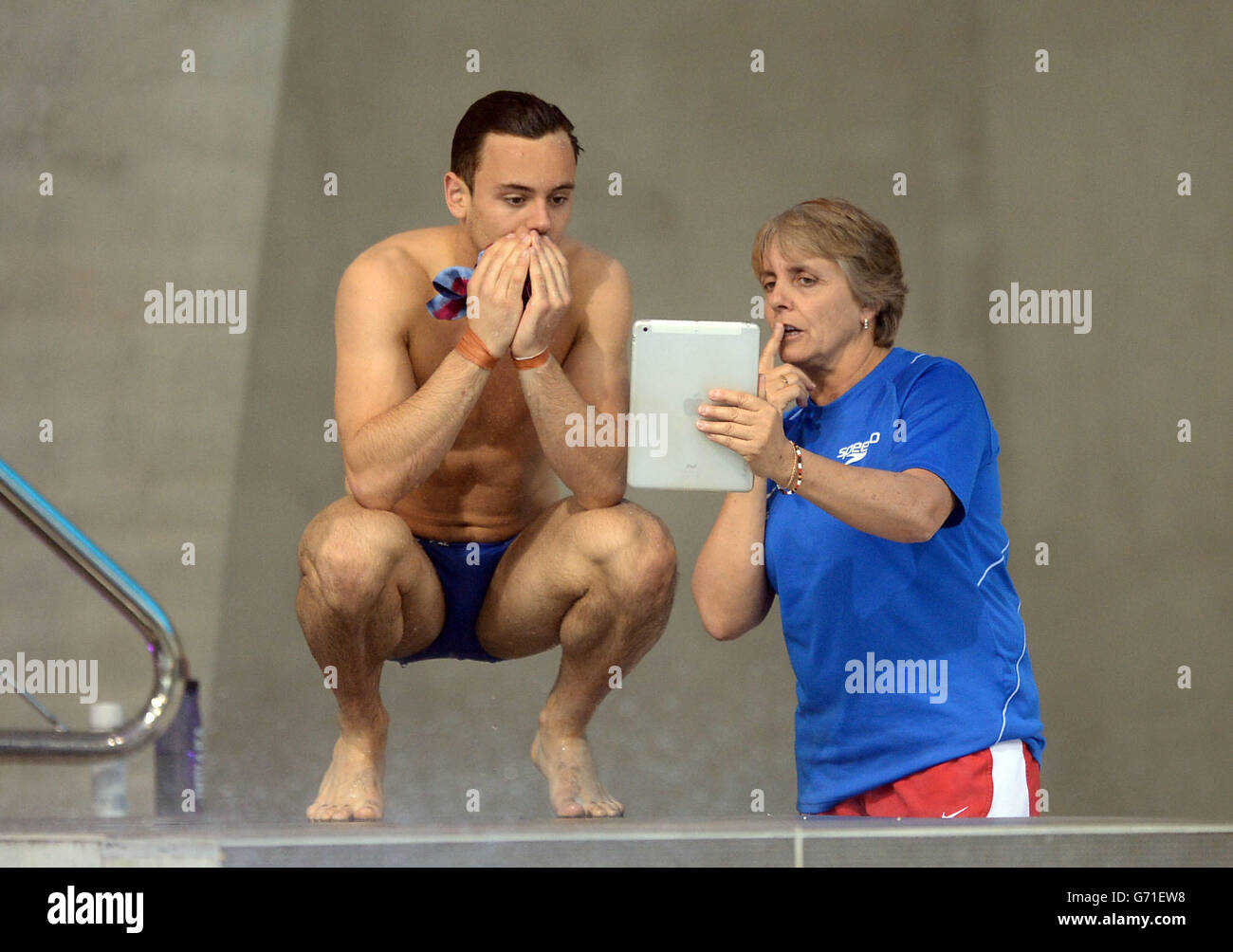 Great Britain's Tom Daley with his coach Jane Figueiredo during day one ...