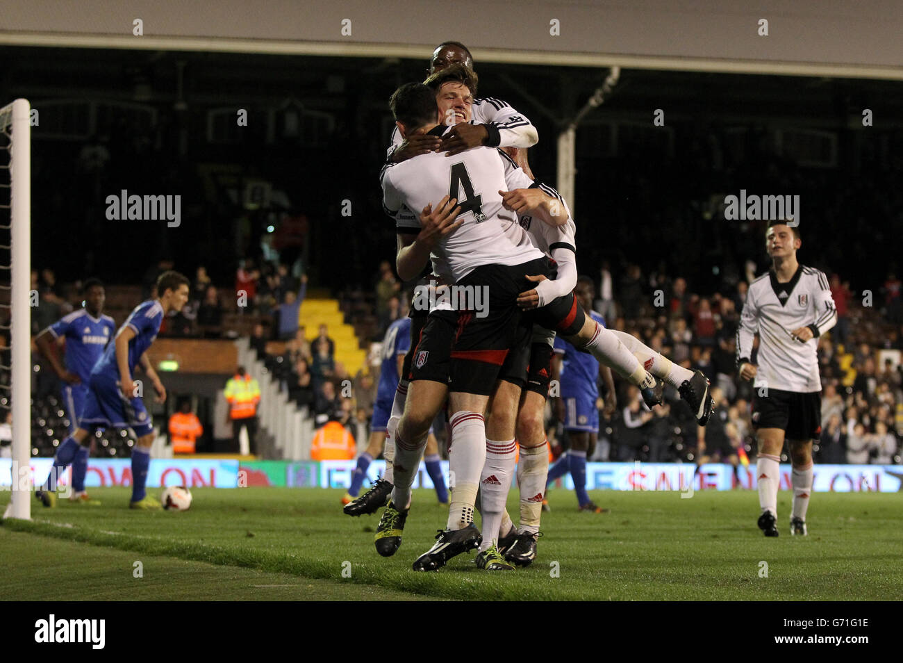 Fulham's Cameron Burgess (facing) celebrates scoring with teammate Liam ...