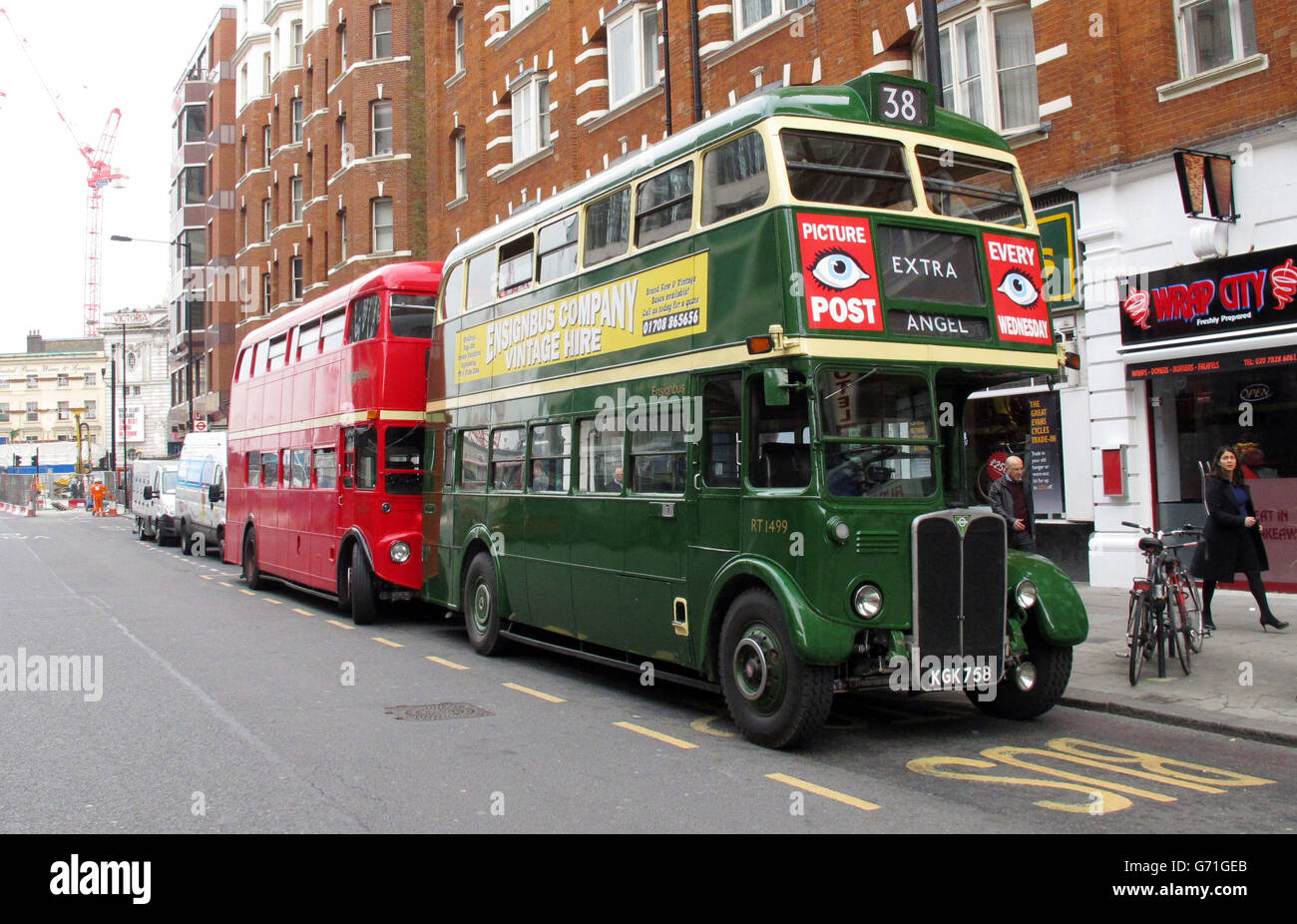Old Routemaster buses are seen in Vauxhall Bridge Road, London, as ...