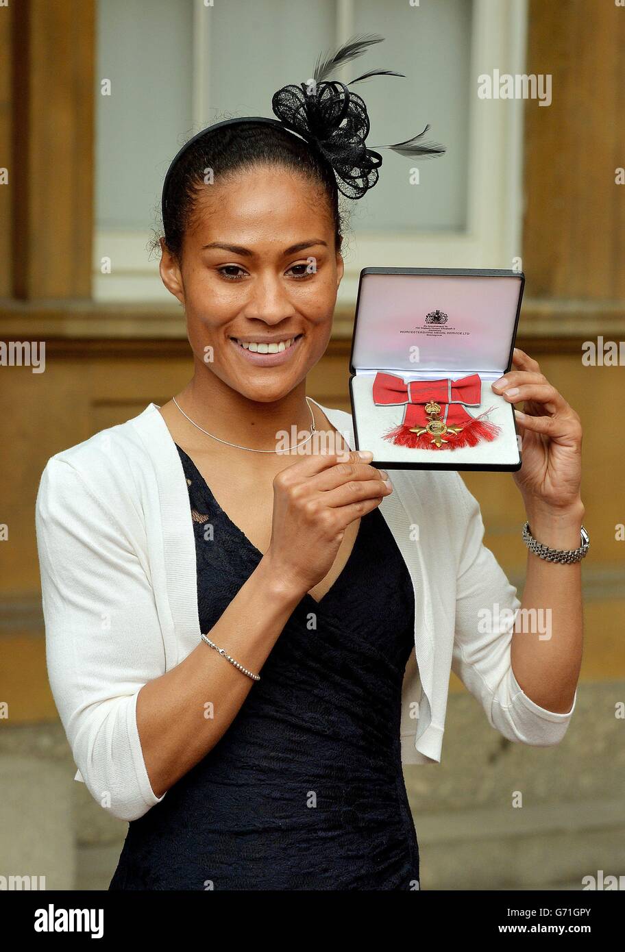 Awarded obe by princess royal investiture ceremony buckingham palace hi ...