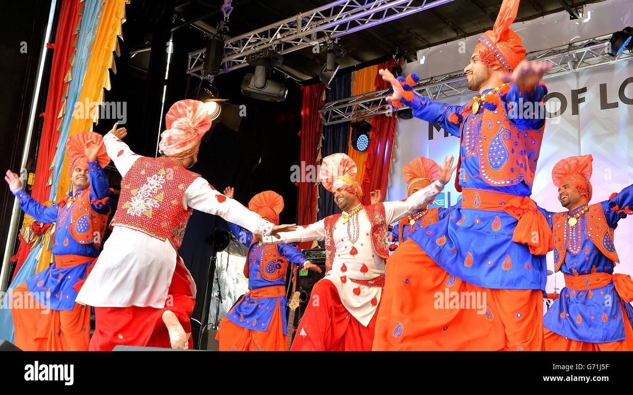 Members of the Asli Baharan Punjab Diyan dance group perform at the ...