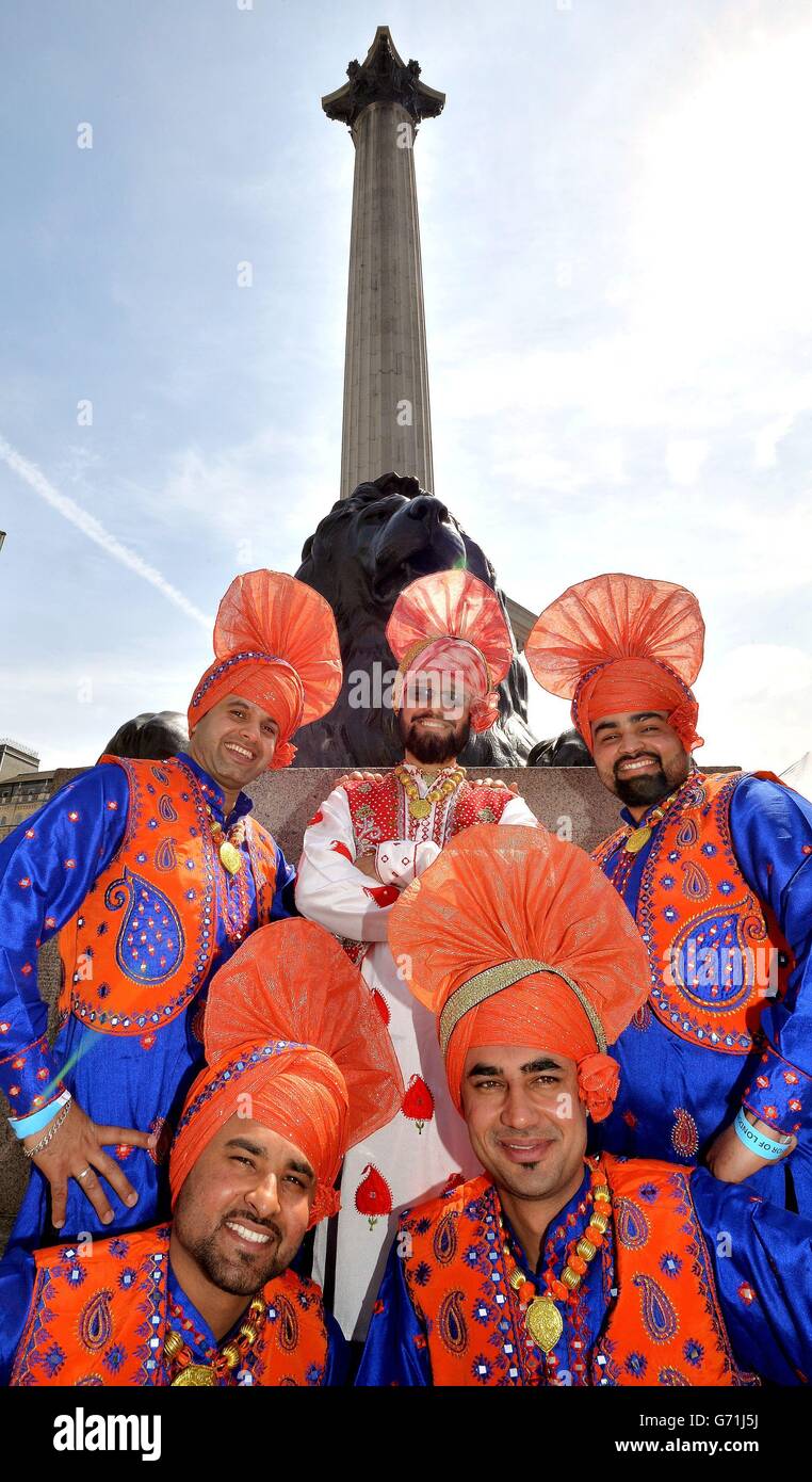 Members of the Asli Baharan Punjab Diyan dance group wait to perform at ...