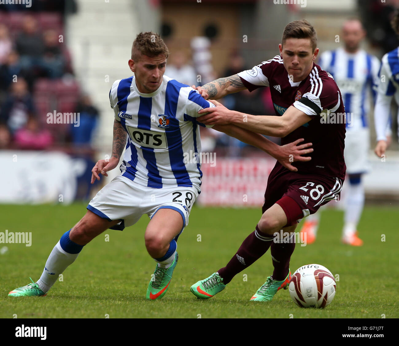 Hearts' Sam Nicholson challenges Kilmarnock's Craig Slater during the ...